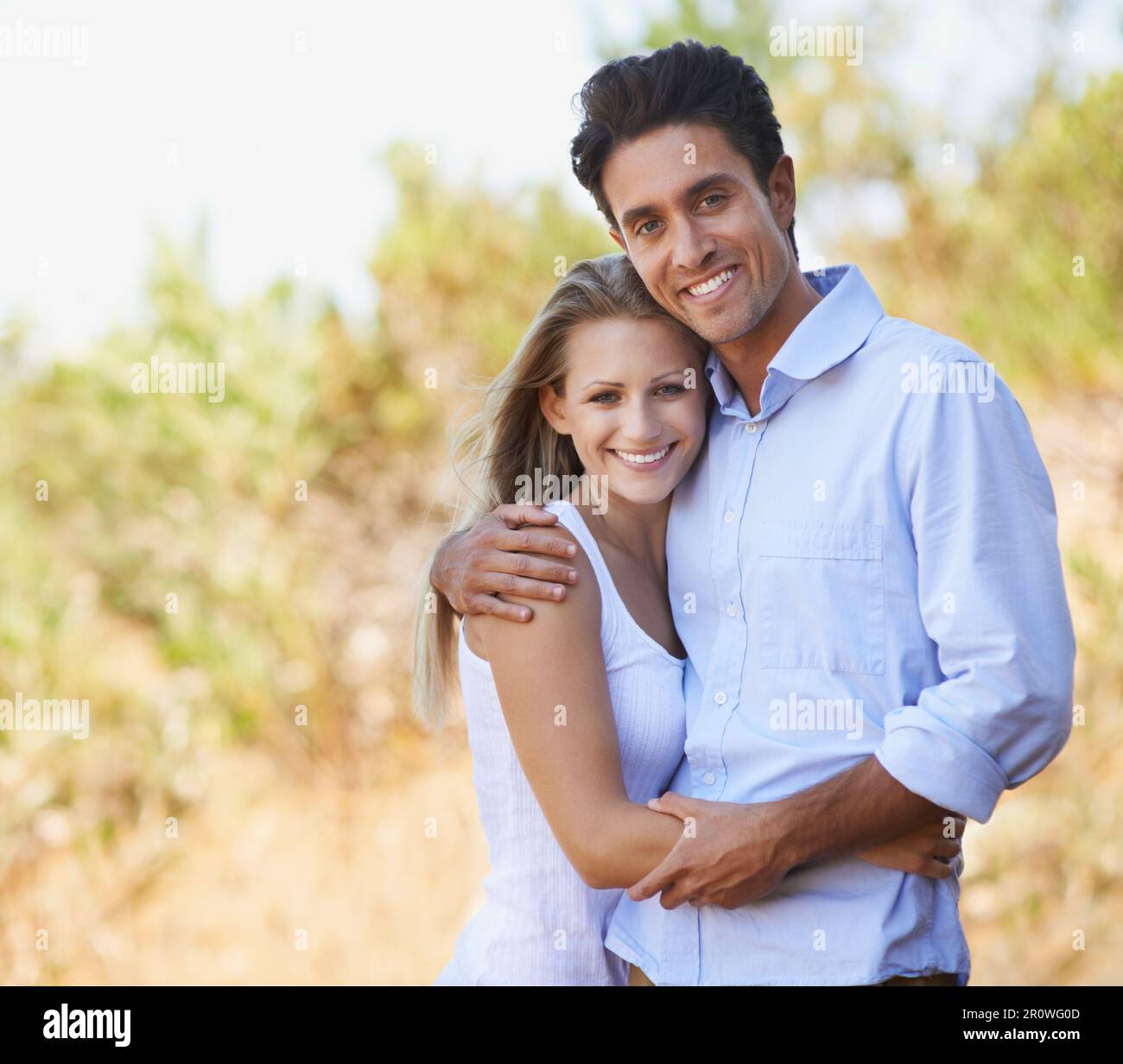 Starting their life together. a loving young couple standing side by ...