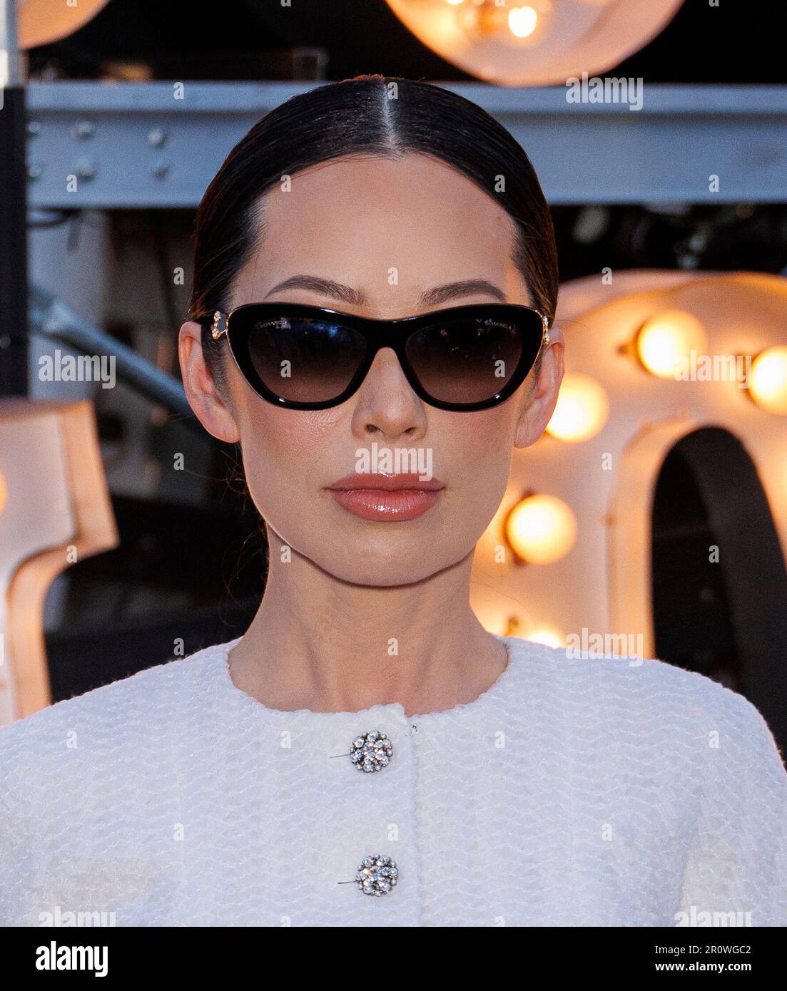 Christine Chiu arrives at the Chanel Cruise 2022/2023 Fashion Show on ...