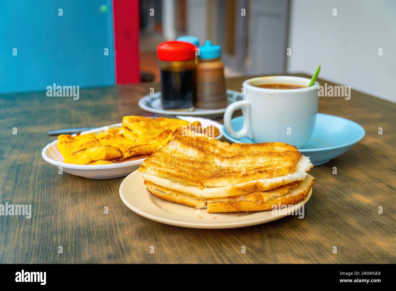Traditional breakfast set and coffee, boiled eggs and toast, popular in ...