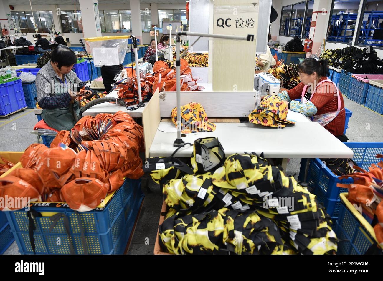 SUQIAN, CHINA - MAY 10, 2023 - Workers process hats for export at a ...