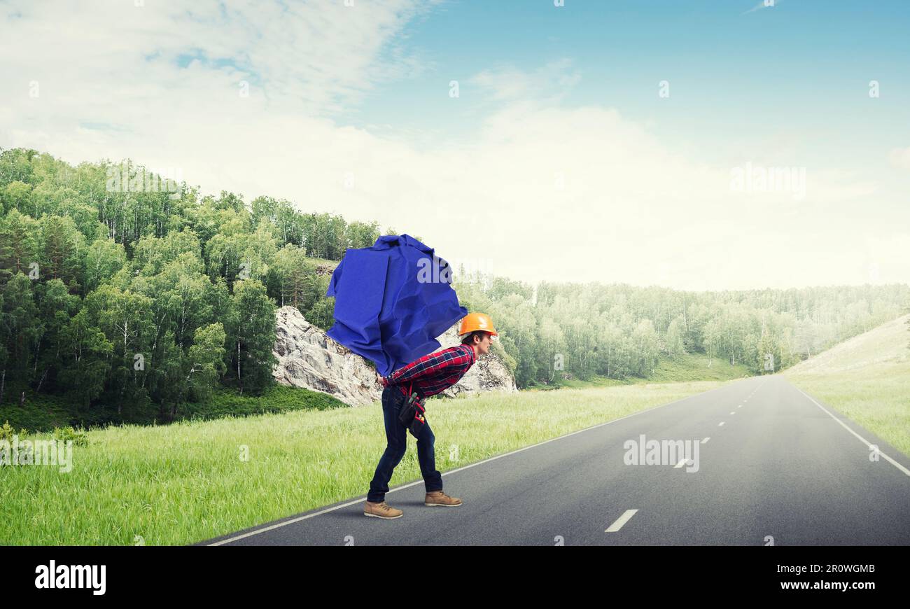 Engineer man carry load Stock Photo - Alamy