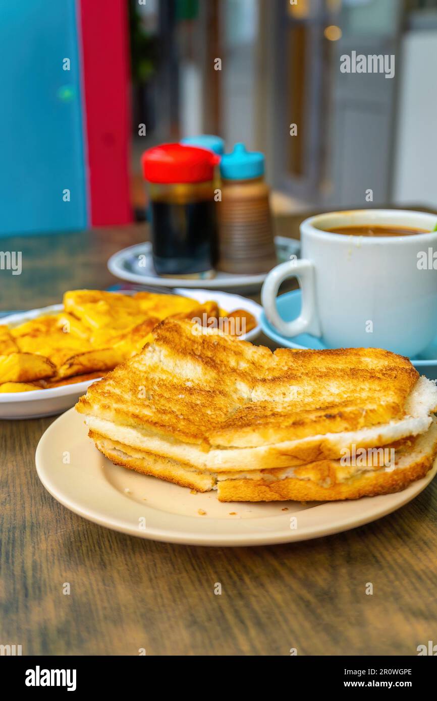 Traditional breakfast set and coffee, boiled eggs and toast, popular in ...