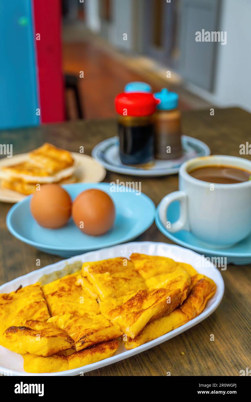 Traditional breakfast set and coffee, boiled eggs and toast, popular in ...