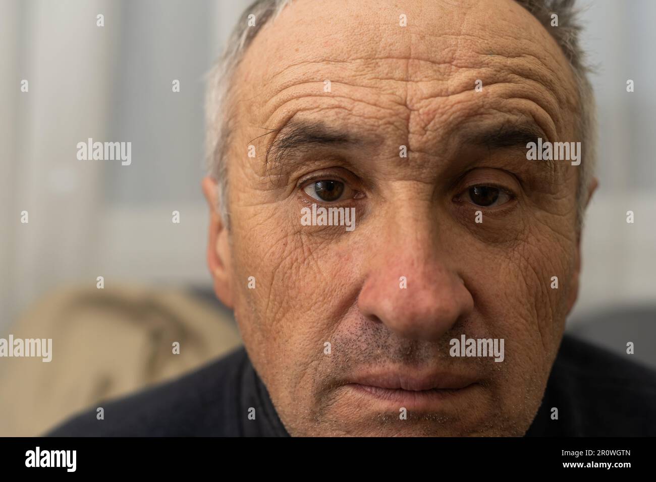 old man face part closeup eyes looks at camera Stock Photo - Alamy