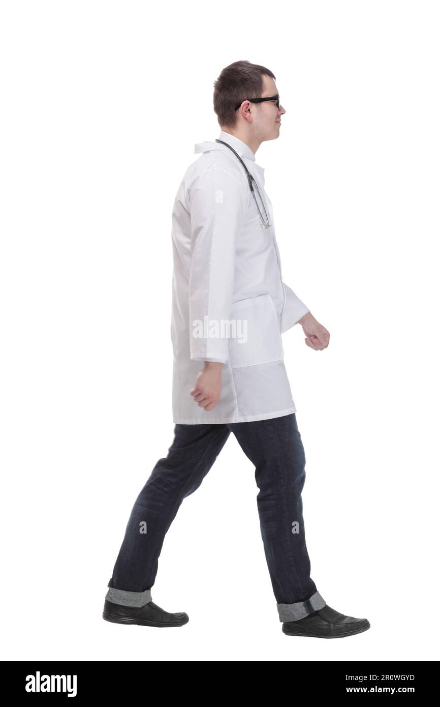 Male doctor walking isolated over a white background -side view Stock ...