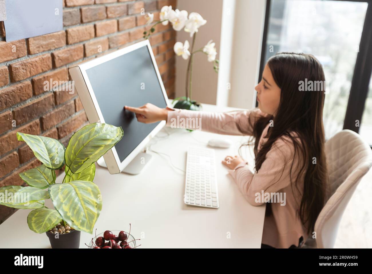 Smiling girl using laptop, student studying at home, digital education ... Smiling girl using laptop, student studying at home, digital education ...