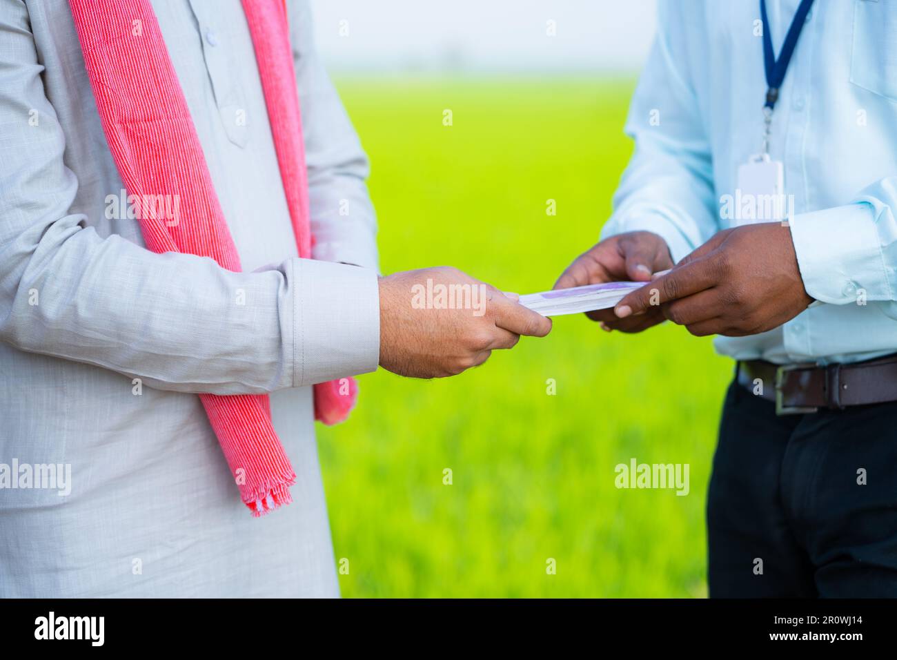 Indian rural farmer giving money hi-res stock photography and images ...