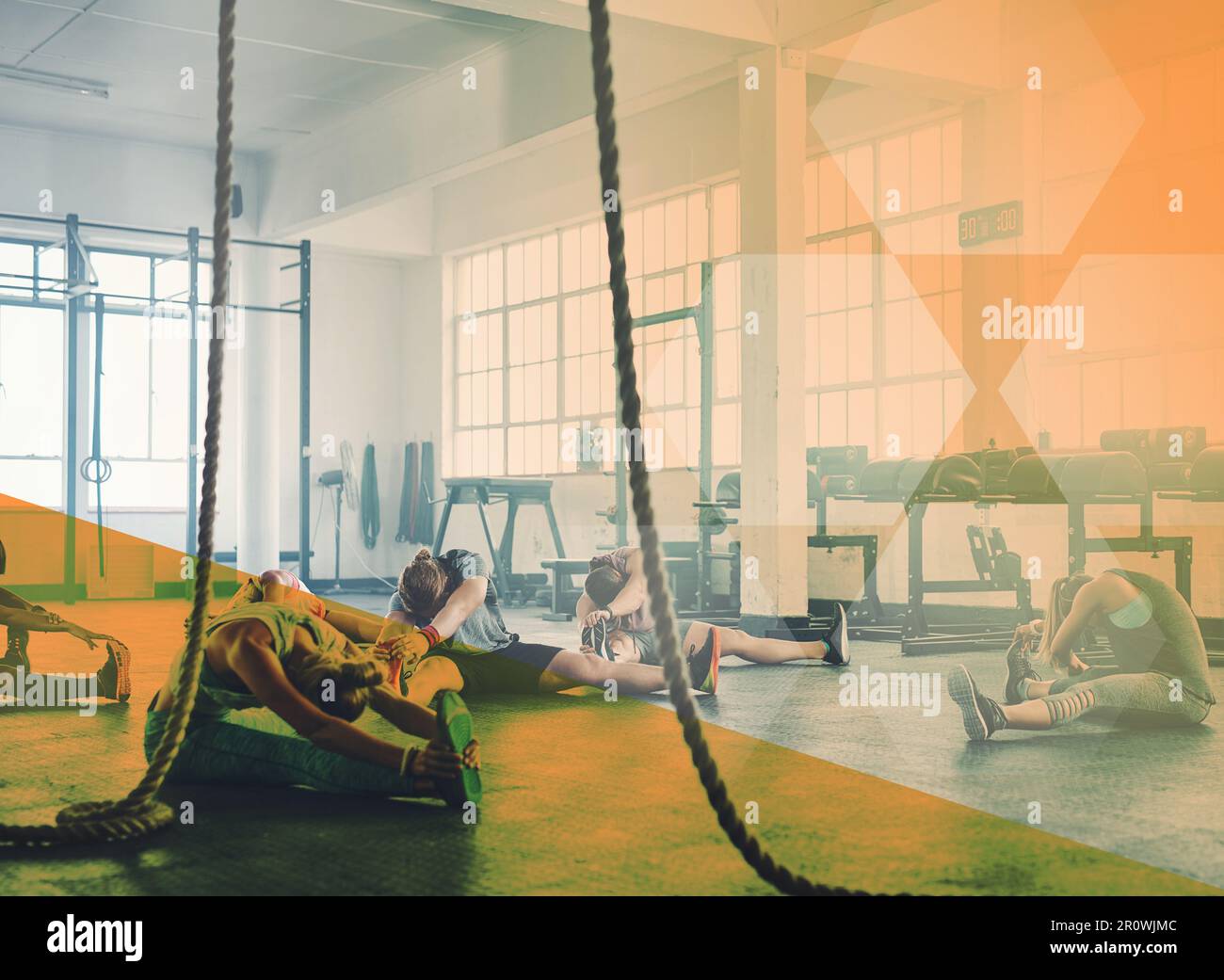 Fitness, stretching and a group of people at gym for exercise, workout ...