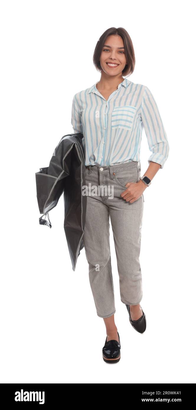 Woman holding garment cover with clothes on white background. Dry ...