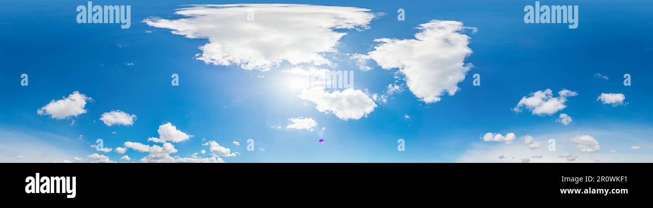 blue sky panorama with puffy clouds, for compositing in 3D graphics and ...