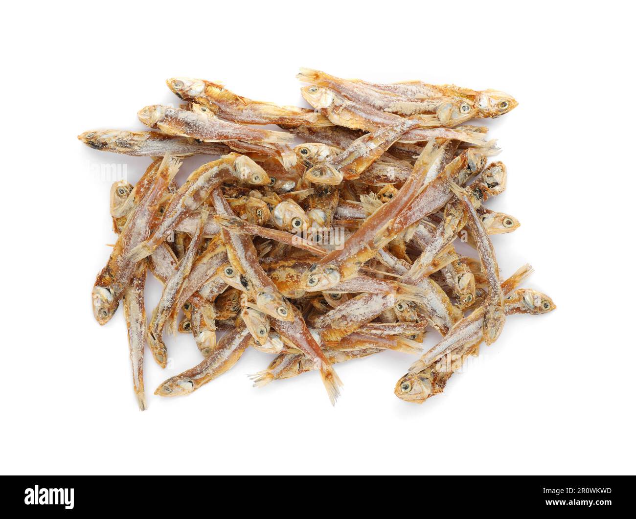 Delicious dried salted anchovies on white background, top view Stock ...