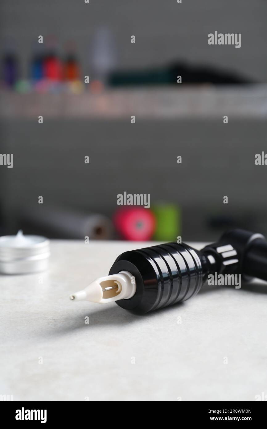 Modern tattoo machine hi-res stock photography and images - Alamy