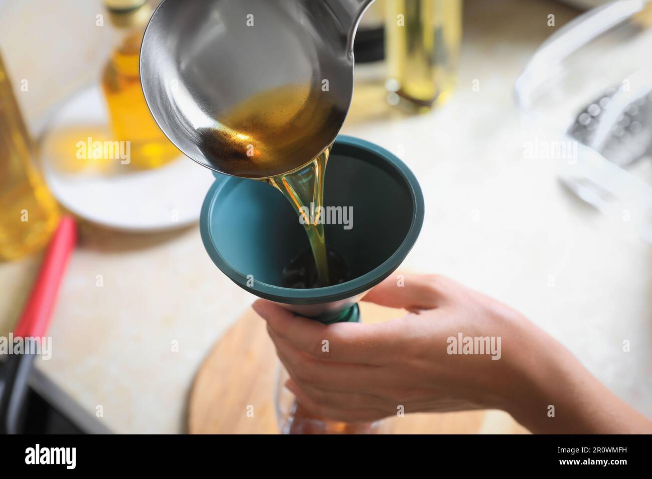 Woman used cooking oil hi-res stock photography and images - Alamy