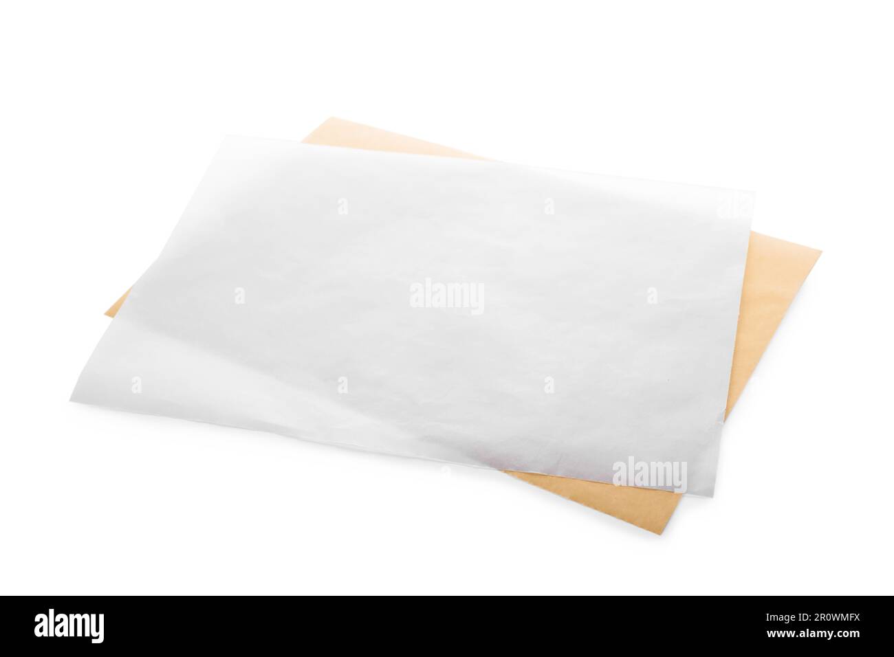 Sheets of baking paper on white background Stock Photo - Alamy