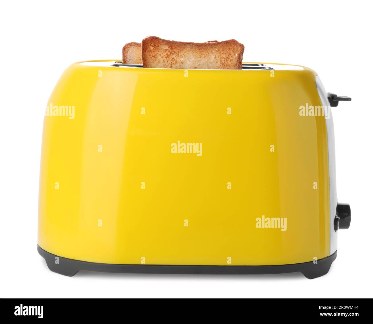 Yellow toaster with roasted bread slices on white background Stock ...