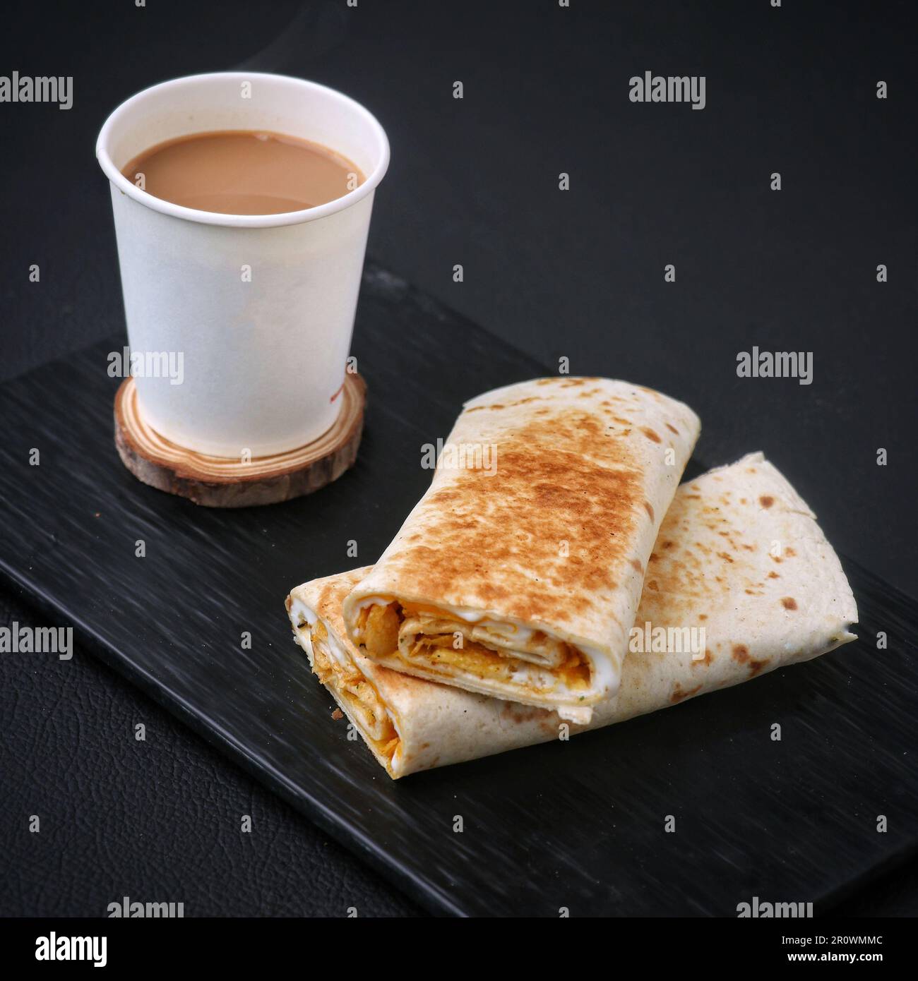 Tea Cup Full Of Tea on a A piece of wood Royalty Free Stock Photo ...