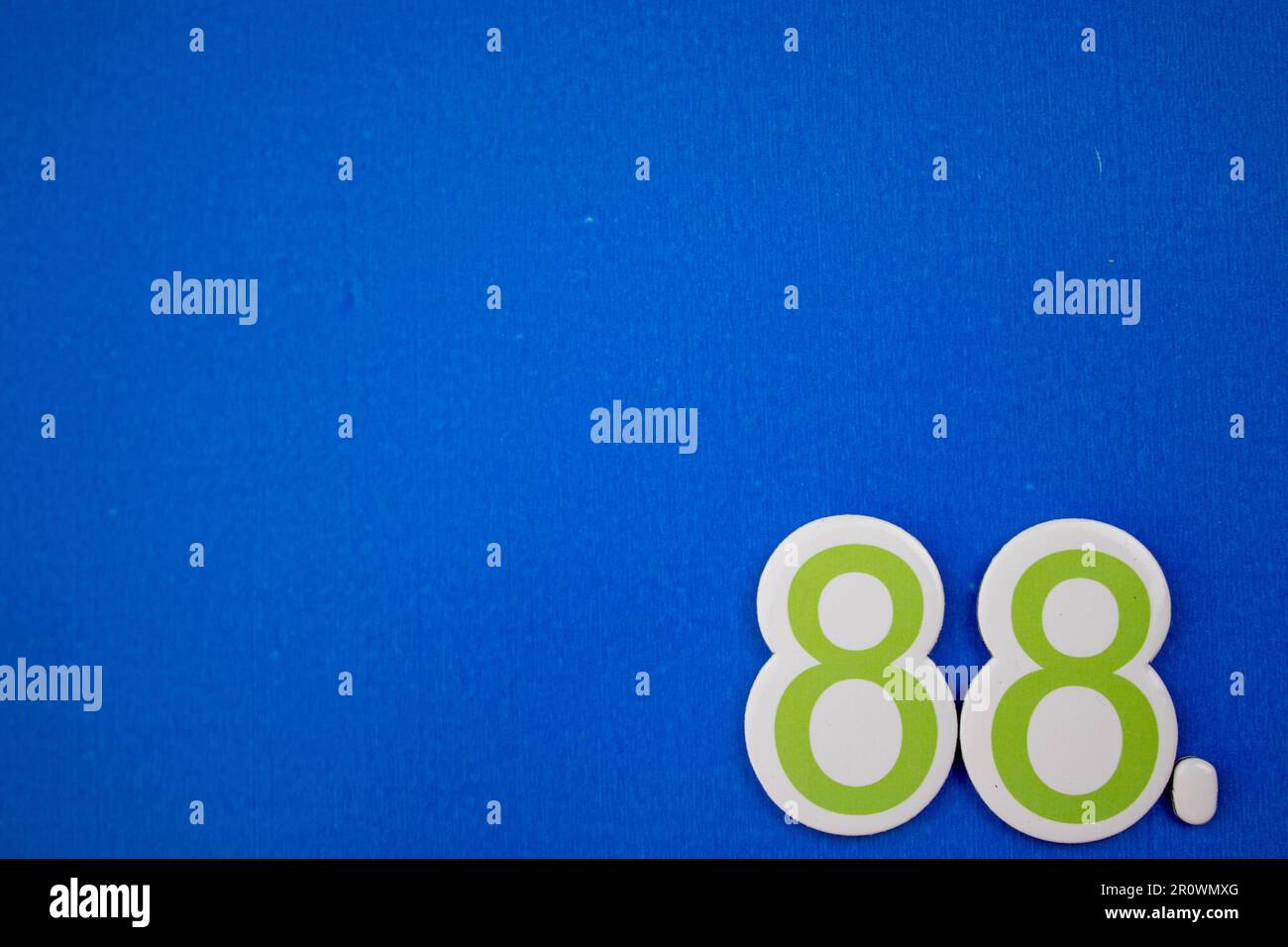The number 88 in dark blue and green color, photographed from above ...