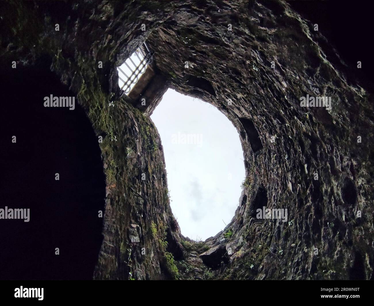 Stone well hole, old construction from inside, fall down in the well ...