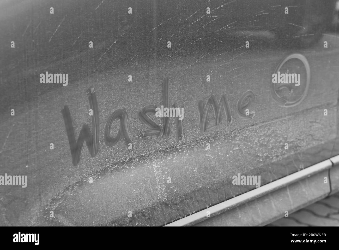Phrase Wash Me and sad emoticon drawn on dirty car, closeup Stock Photo ...