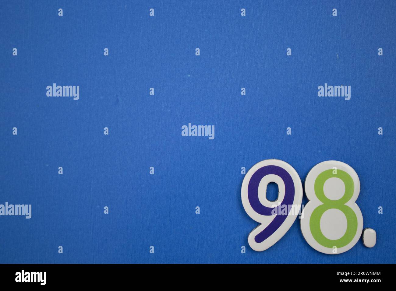 Placed on the edge of the blue background, photographed from above ...