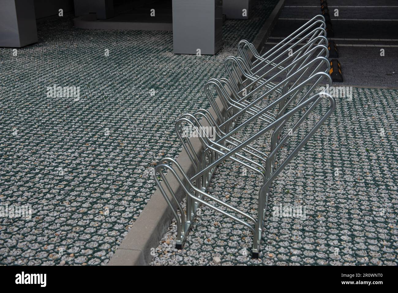 Empty metal parking rack for bicycles outdoors Stock Photo - Alamy