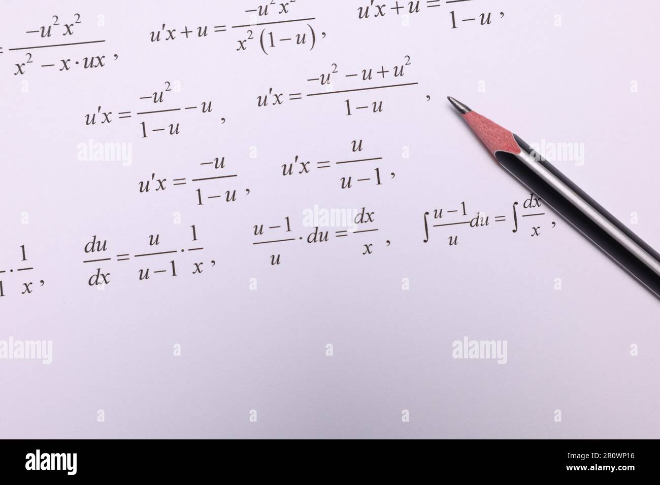 Sheet of paper with mathematical formulas and pencil, top view Stock ...