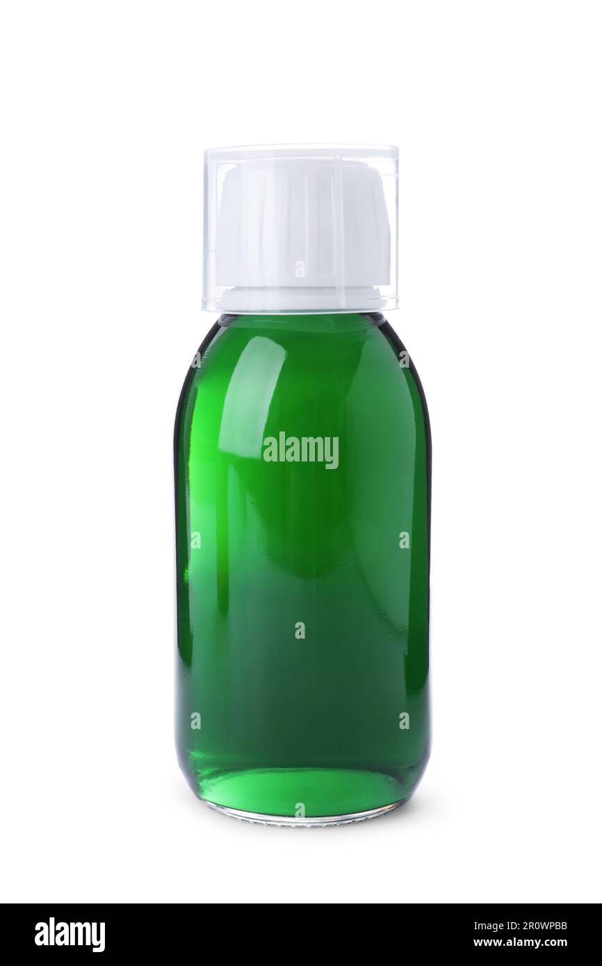 Bottle of syrup with measuring cup on white background. Cough and cold ...