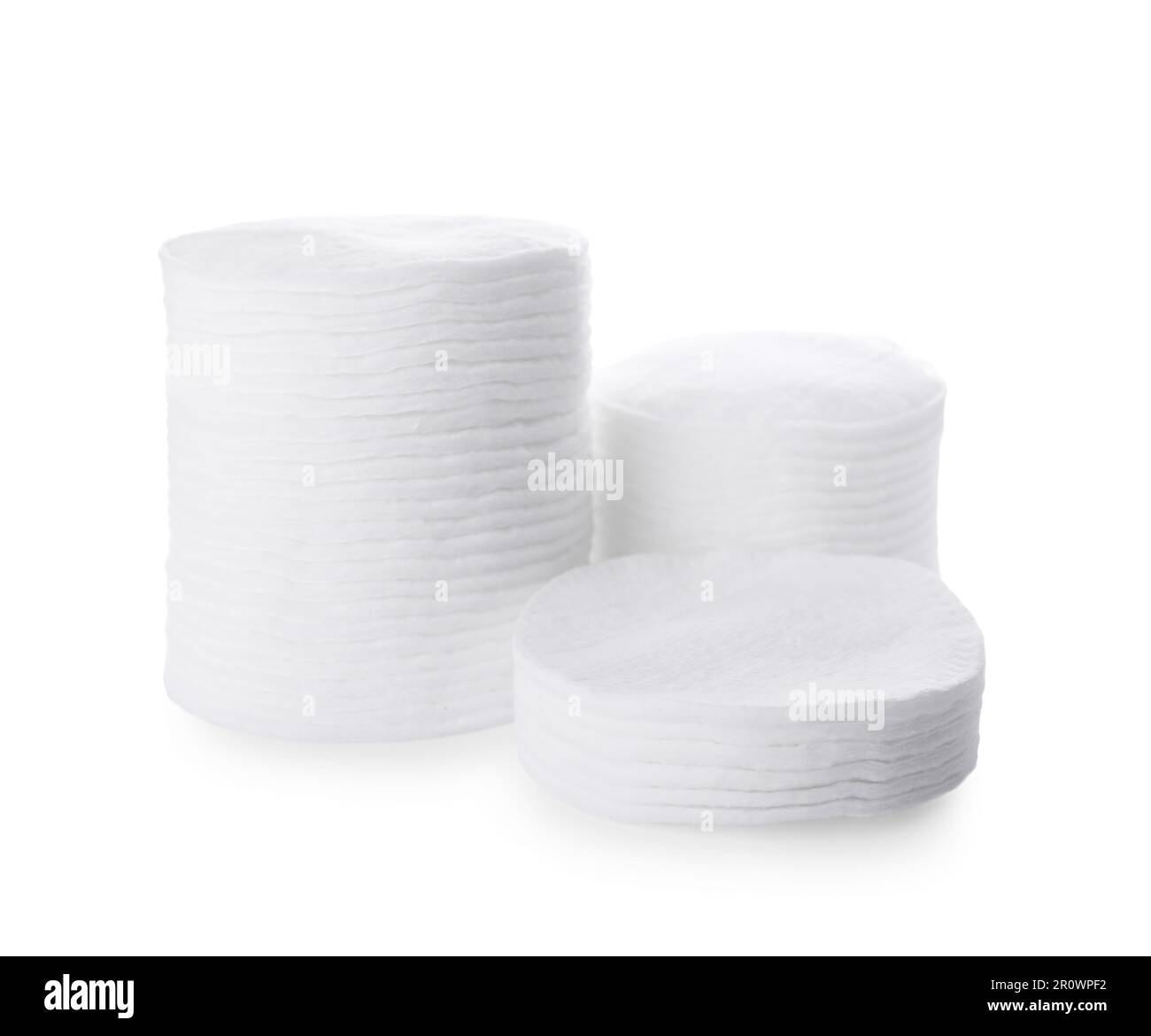 Stacks of cotton pads on white background Stock Photo - Alamy