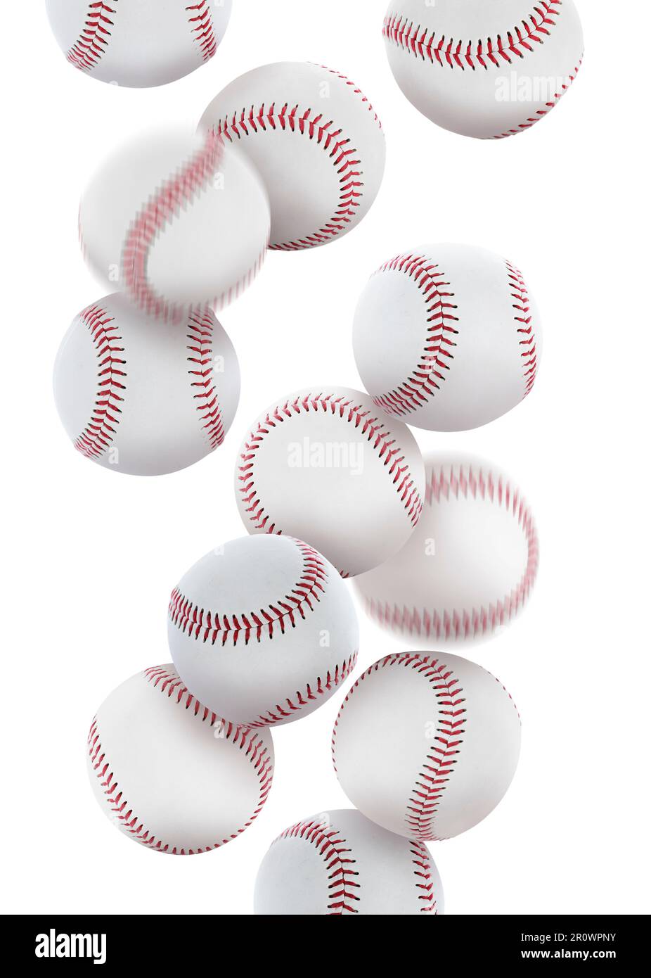 Many baseball balls falling on white background Stock Photo - Alamy