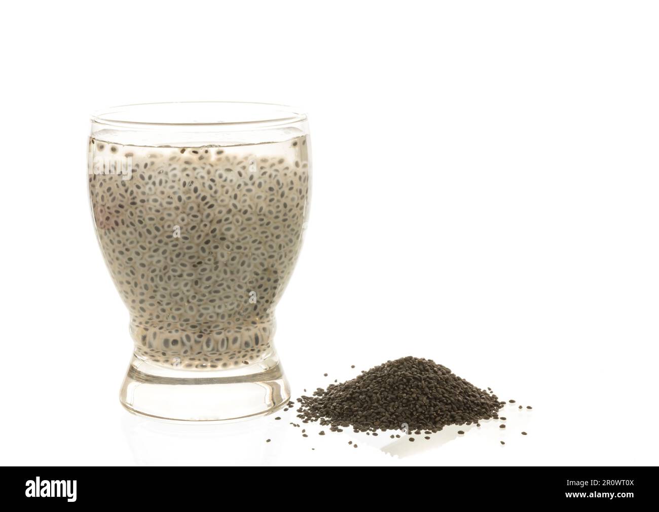Sweet basil seed drink in glass of water isolated on white background ...