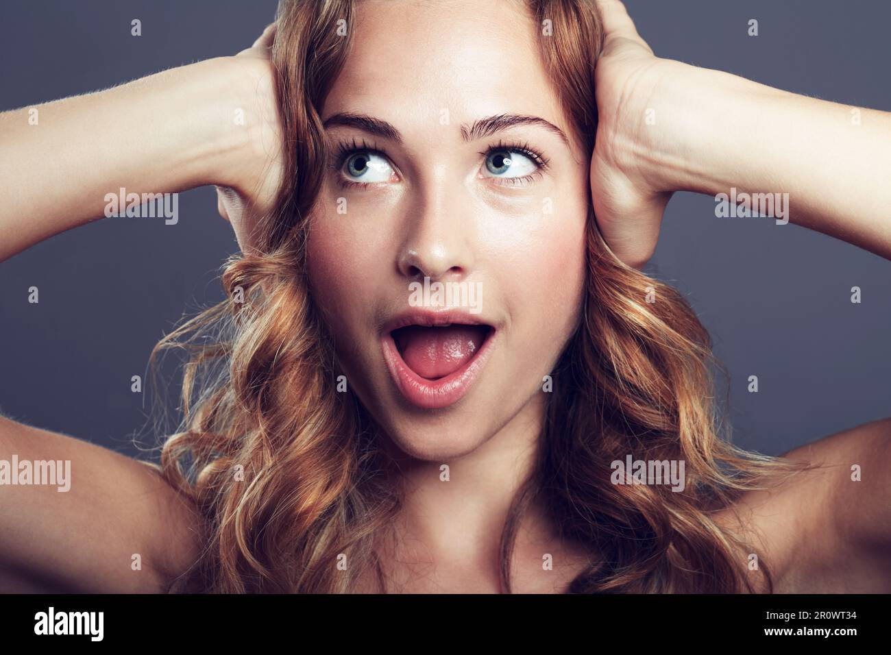 Surprise, thinking and face of an excited woman with a smile isolated ...