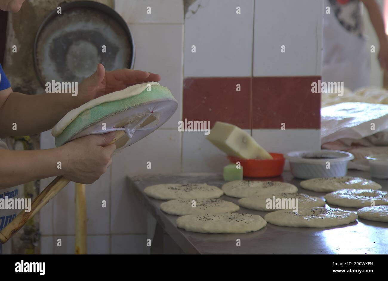 Preparation of bread at the market in Tashkent, Uzbekistan Stock Photo ...