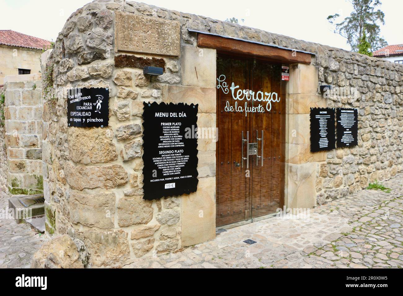 Menu signs at the entrance to the restaurant La Terraza de la Fuente ...