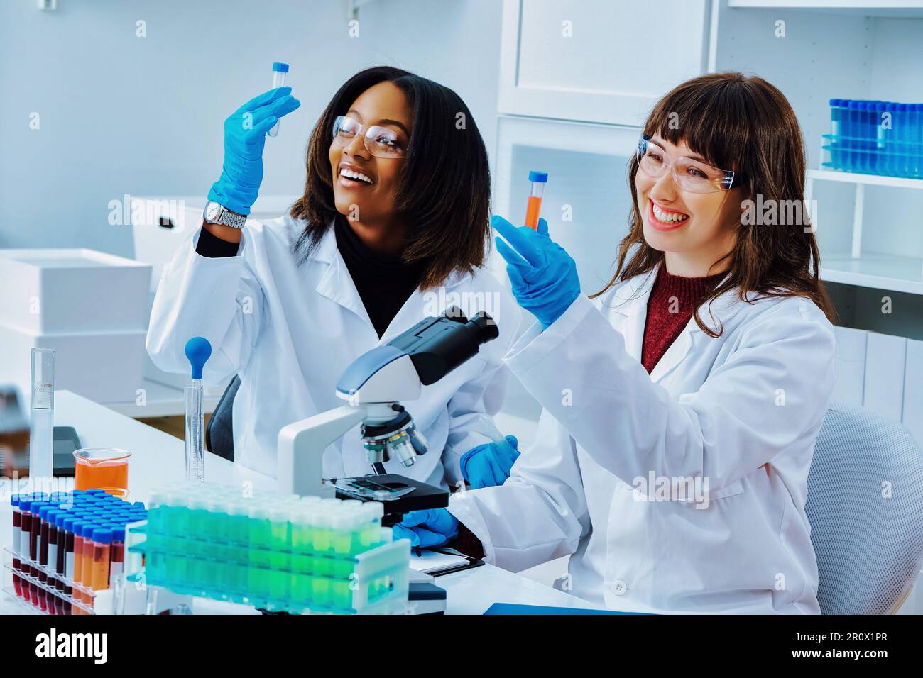 African american scientist working in hi-res stock photography and ...
