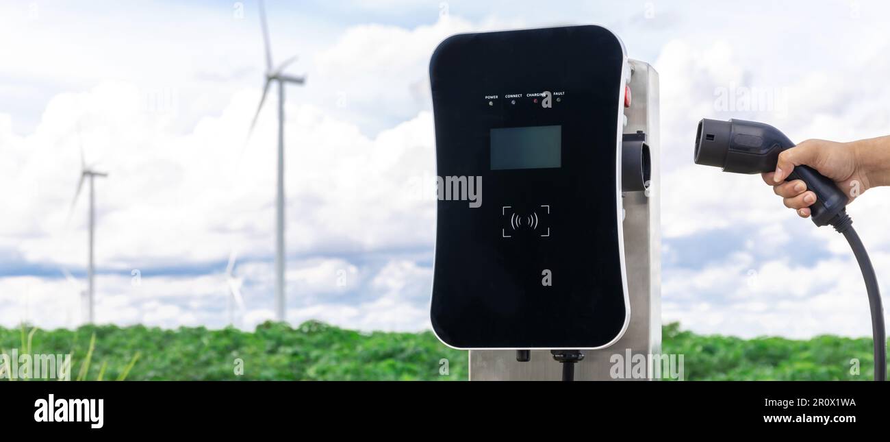 Progressive natural scenic with windmill generator where hand insert ...