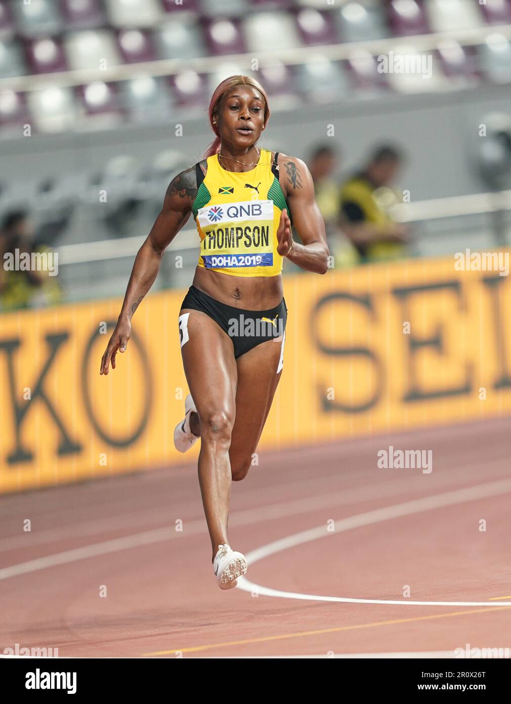 Elaine Thompson running the 200m at the 2019 World Athletics ...