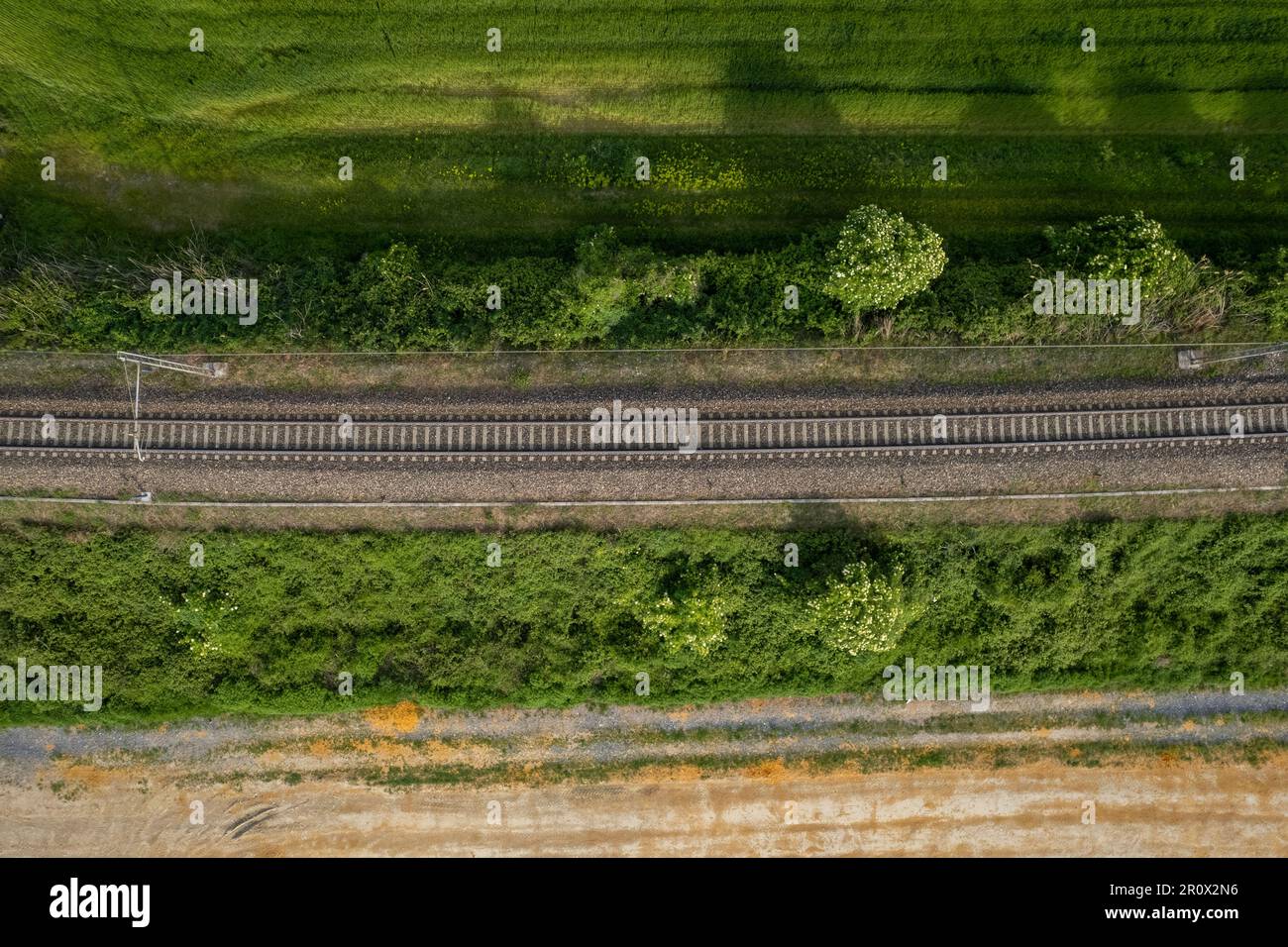 Flying over railway tracks, top view. Railway track tracks line railroad train rail aerial photo ...