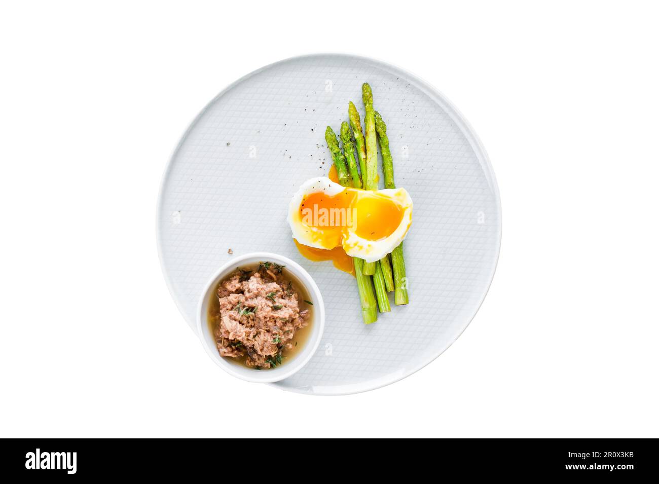 Baked mini asparagus with egg and tuna. Isolated on white background ...