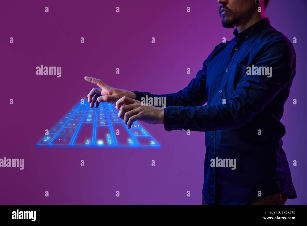 Businessman, programmer typing on virtual, digital, wireless keyboard. Innovation, cyberspace ...