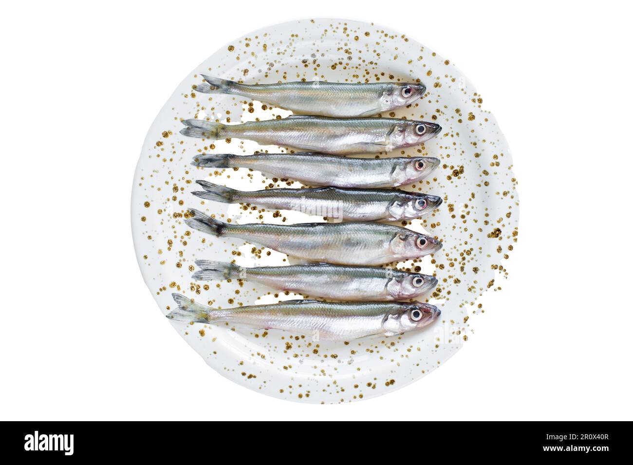 Raw mackerel on a plate Cut Out Stock Images & Pictures - Alamy