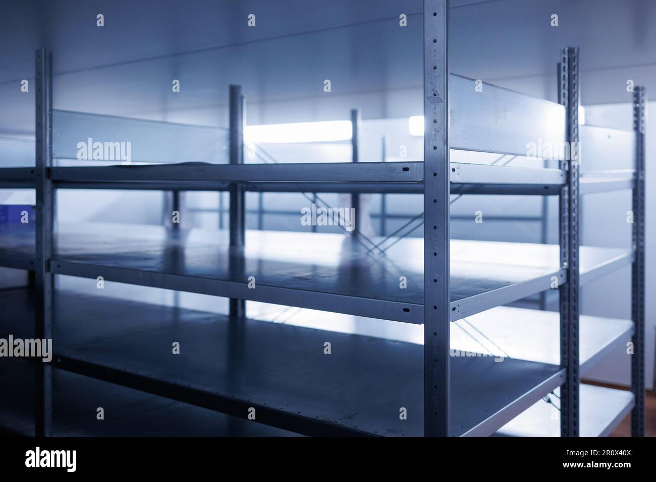 A metal shelf in an empty room for storage in a food factory Stock ...