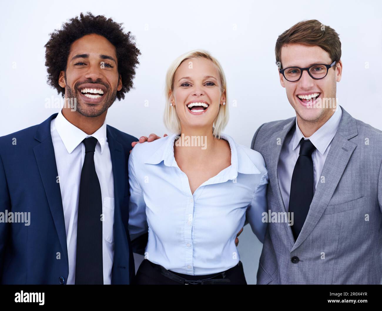 Positive attitude - weve got loads. Portrait of three happy colleagues ...