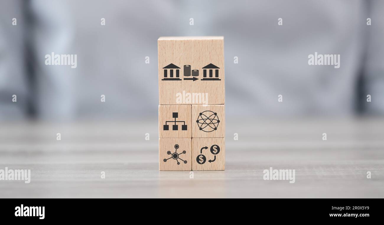 Wooden blocks with symbol of money transfer concept Stock Photo - Alamy
