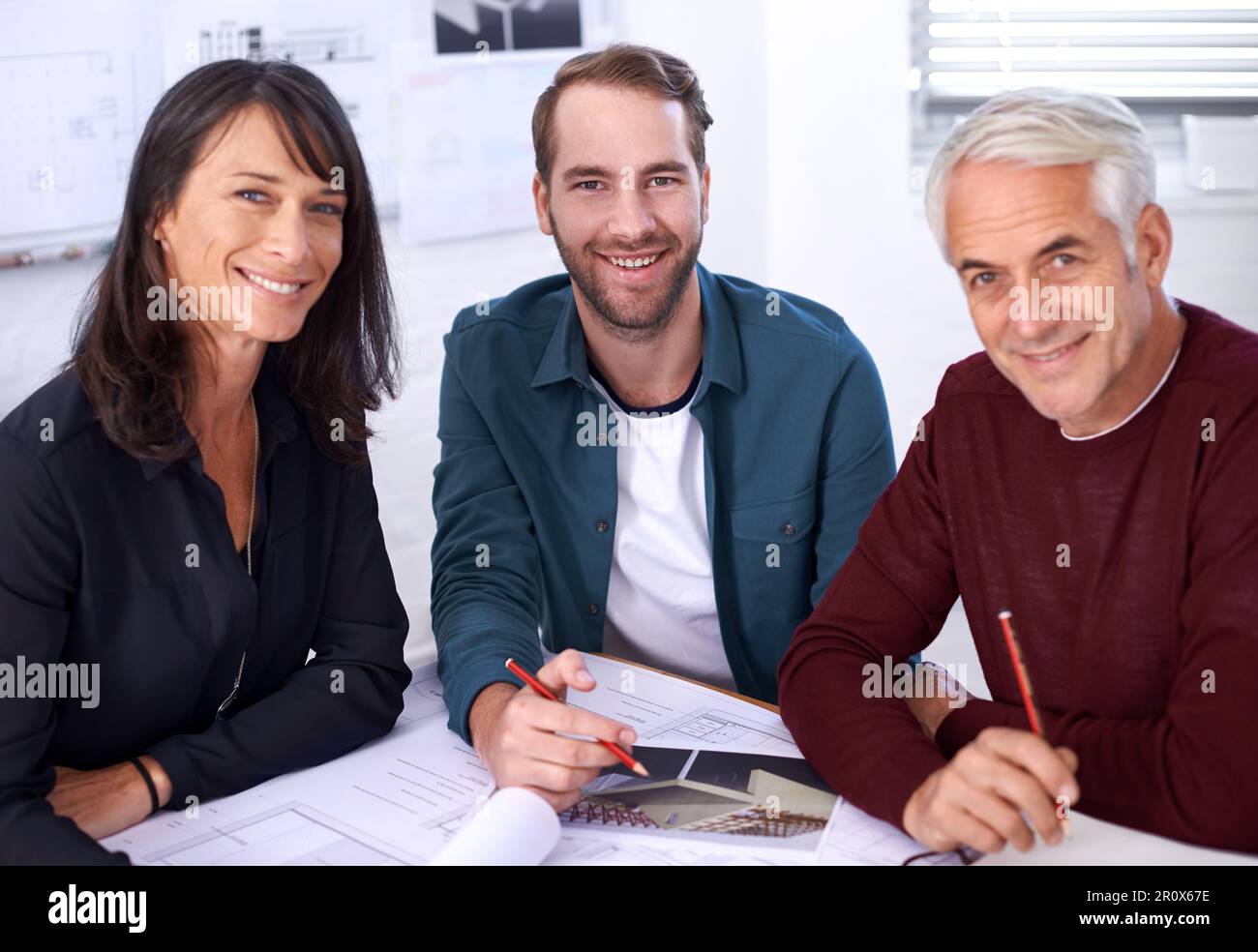 The number one team in architecture. Cropped portrait of three ...