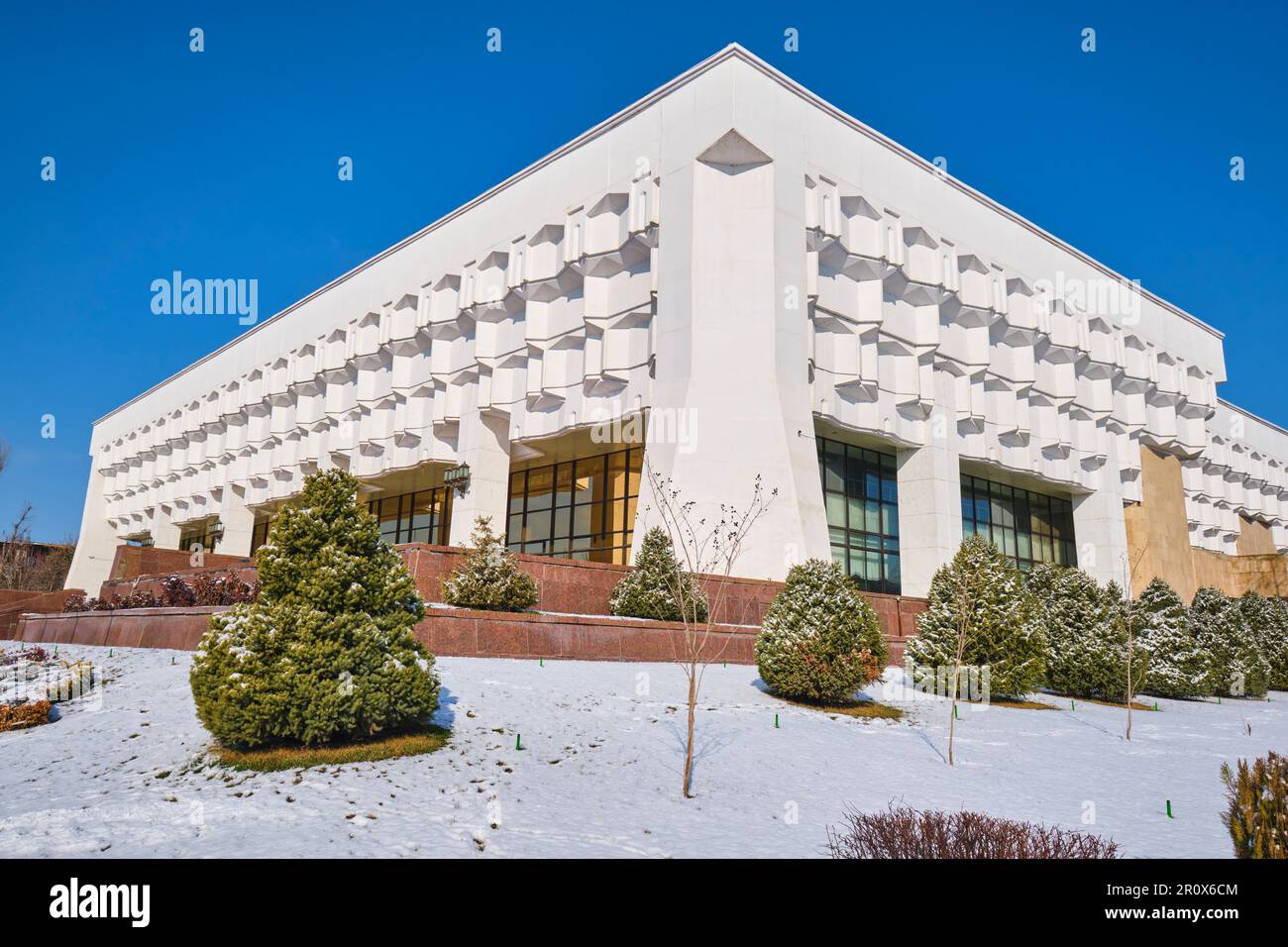 View of the modern, Brutalist style facade of the Turkistan Concert ...