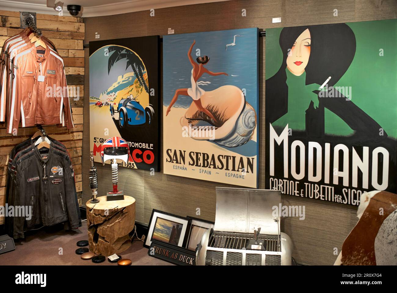 Vintage objects and paintings showroom display Stock Photo - Alamy