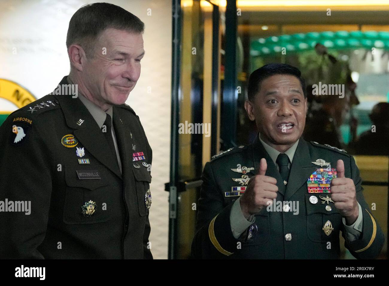 Philippine Army Commanding General Lt. Gen. Romeo Brawner Jr. right, gestures beside United ...