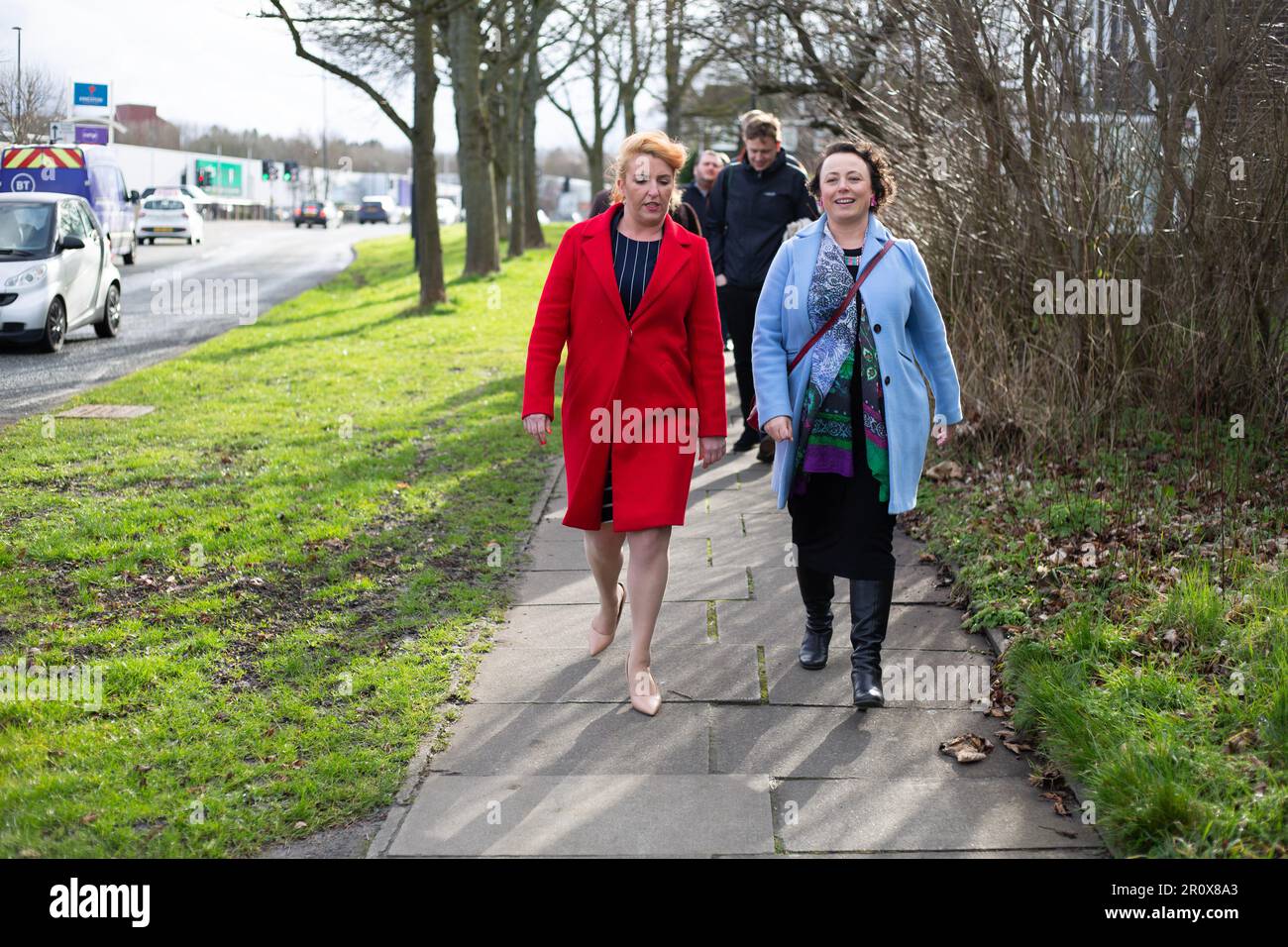 Labour MP Louise Haigh (left) walks along a footpath with Labour MP ...