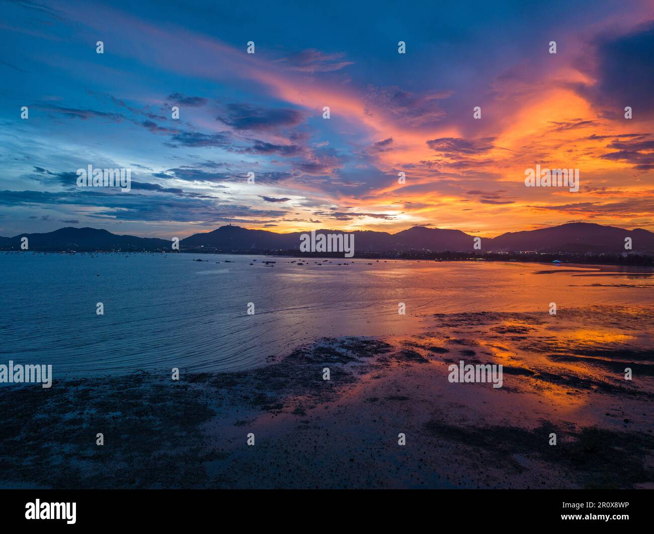 aerial view reflection of colorful cloud in bright sky of sunset above ...