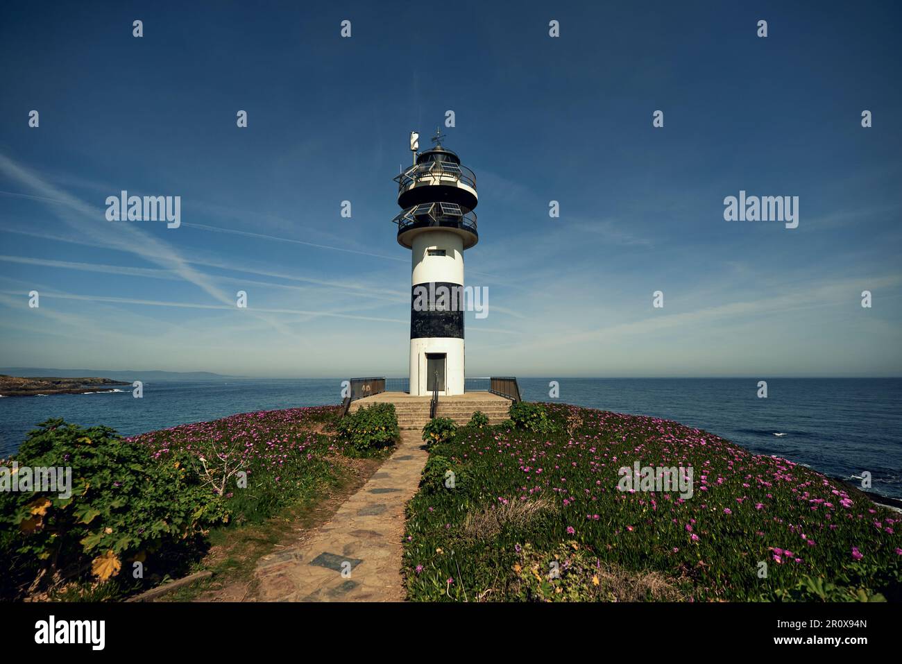View of the lighthouse Of Illa Pancha in the borderline between Galicia ...